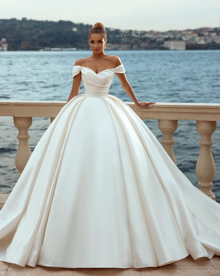 Most Pinned Wedding Dresses: 18 Gowns + FAQs
